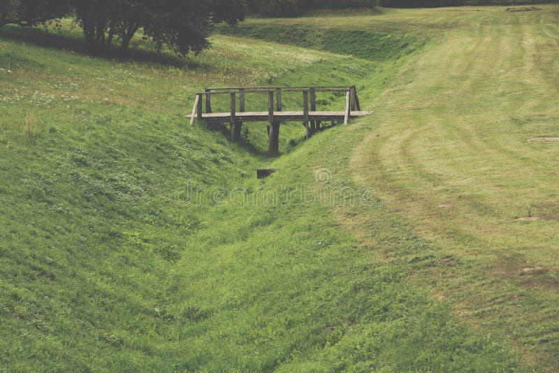 Footbridge Over Drainage Ditch Stock Image - Image of blue, runoff ...