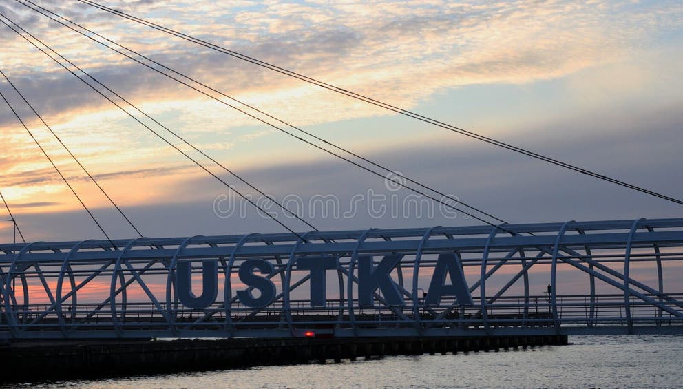 Footbridge Swing in Ustka at Sunset Stock Photo - Image of waves, swing ...