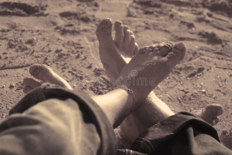 Footies stock image. Image of ocean, beach, toes, couple - 1125493