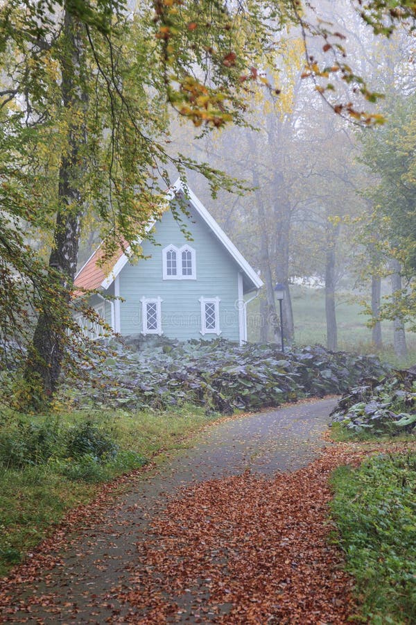 Red Swedish House Amongst Autumn Leaves Stock Image - Image of ...