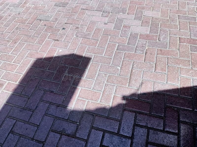 Footpath Bricks and the Building Shadow Stock Photo - Image of shadow ...