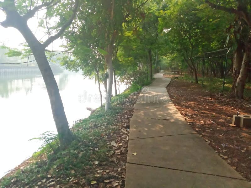 Footpath on the Edge of a Beautiful Artificial Lake. Stock Image ...