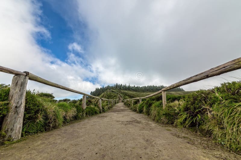 Footpath with Railing in a Hilly Forest Stock Photo - Image of footpath ...