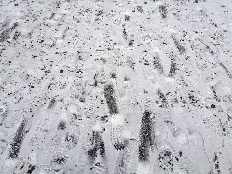 Footprints in the White Snow, a Boot Print on the Path. Stock Photo ...