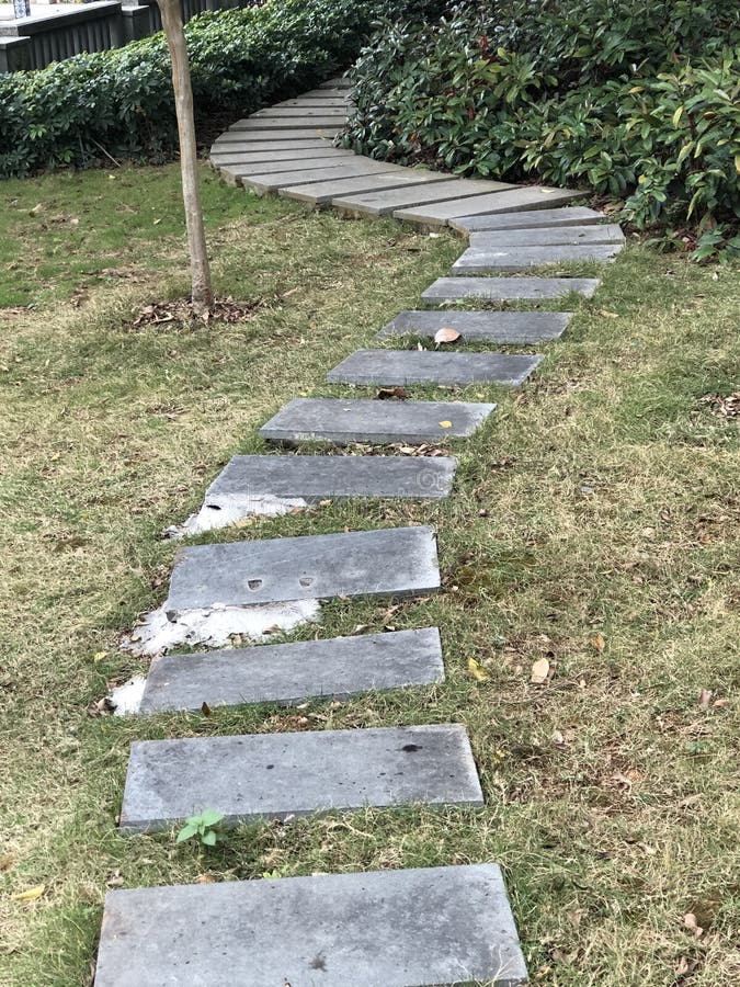 A Footpath Slabs Lying in the Grass Â Stock Photo - Image of green ...