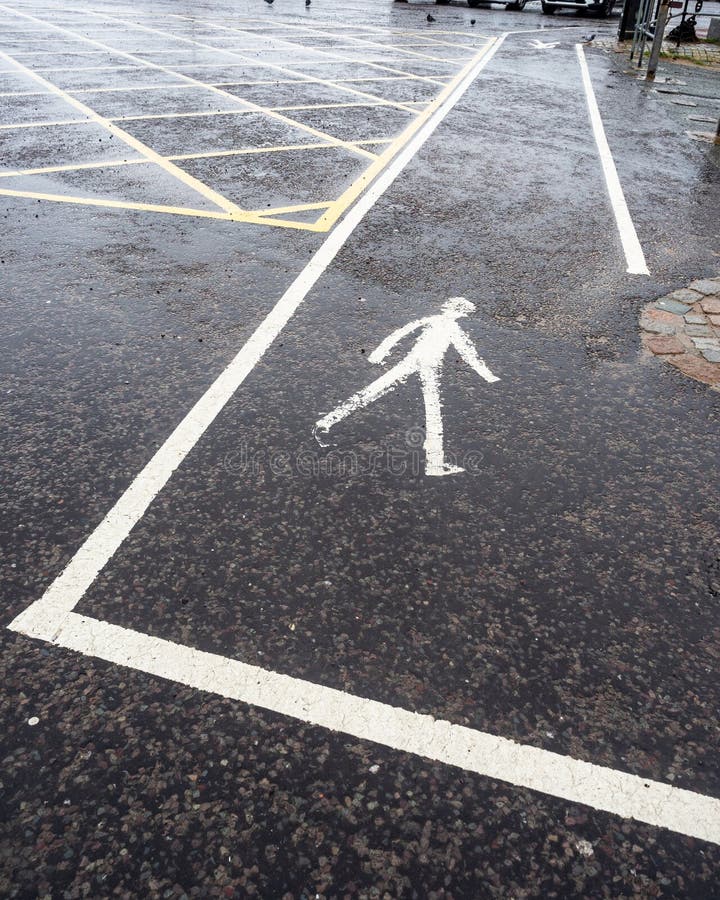 Footpath with White Direction Markings Painted on the Ground Stock ...