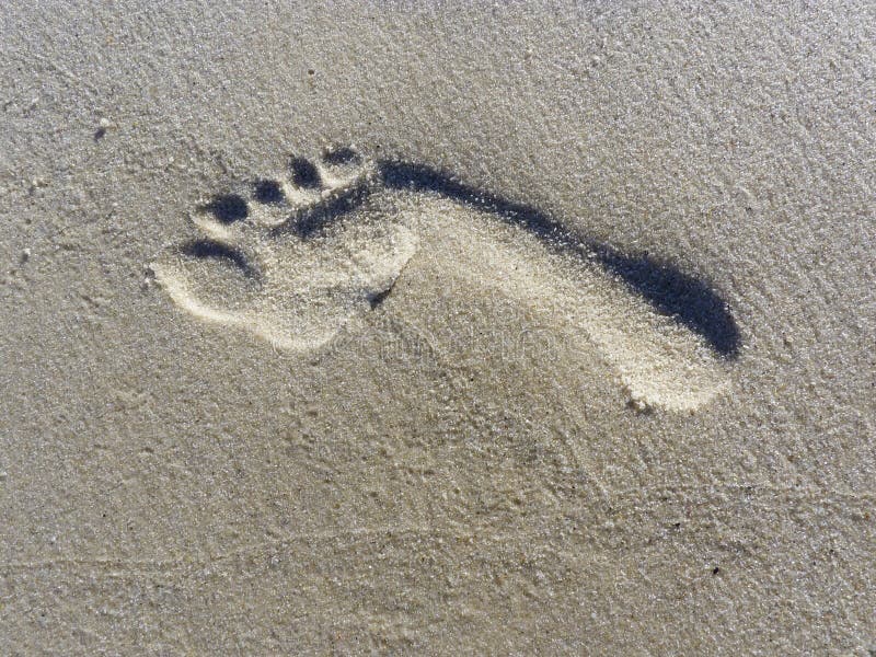 Single footprint on sand stock image. Image of explore - 5742053