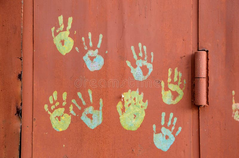Handprints on the door stock image. Image of textured - 281477473