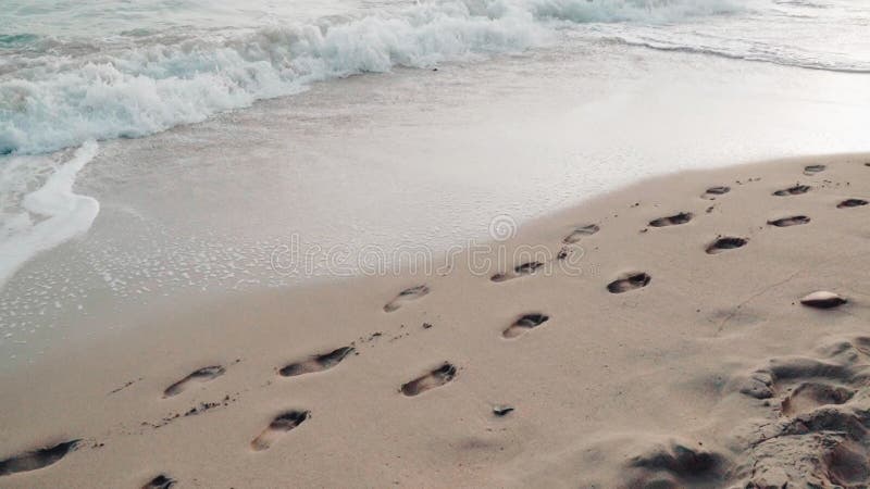 Footprints of People Walking on the Beach Stock Footage - Video of ...
