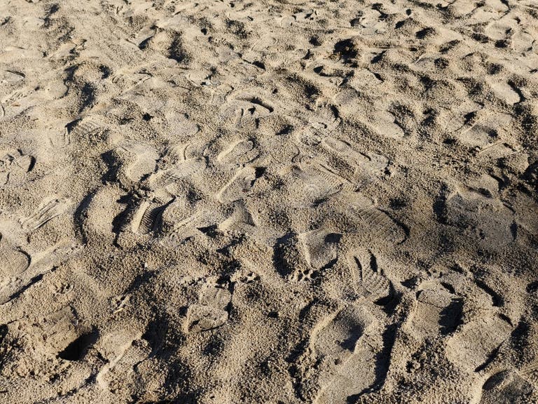 Many Footprints on the Sand at the Beach Stock Image - Image of sand ...