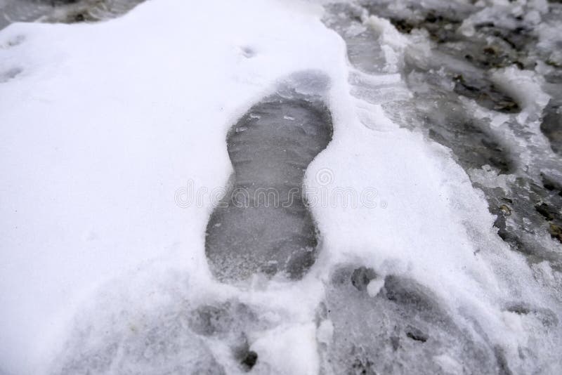Footprints in the snow stock image. Image of footprint - 267762739