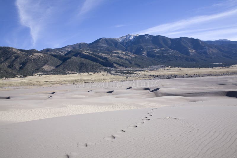 Footprints On Ridge Of Snow Capped Mountain Stock Photo - Image of alps ...