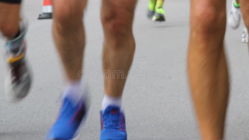Footrace in the Road with Athletes in Sneakers Stock Footage - Video of ...