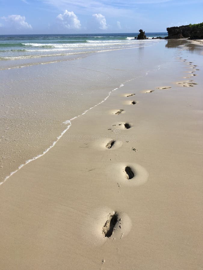 Footsteps on the beach stock image. Image of beach, marked - 168960413