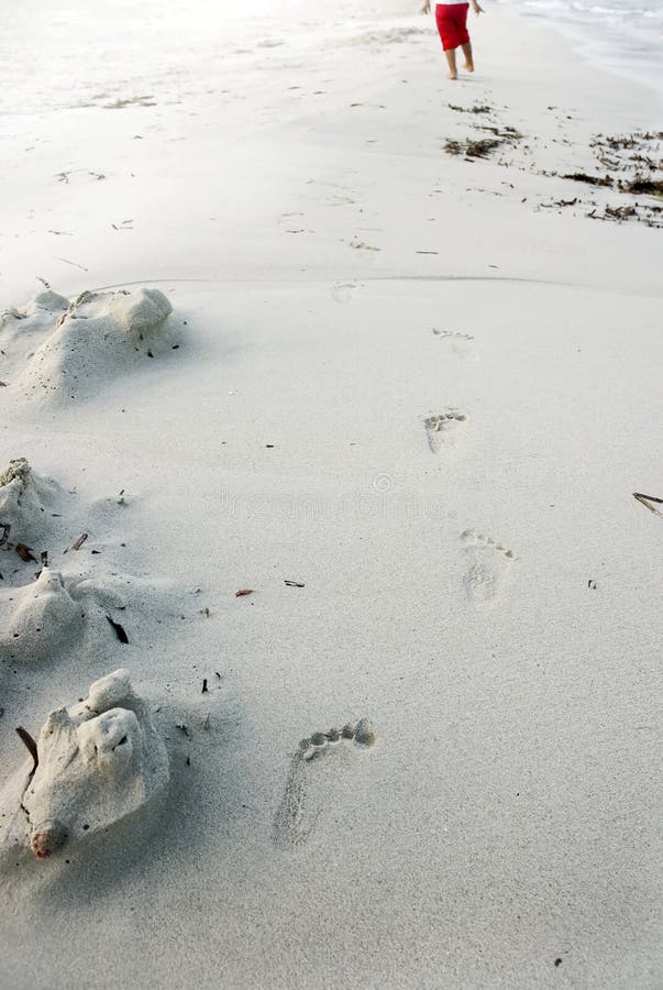 Footsteps in the sand stock photo. Image of barefoot - 32005134