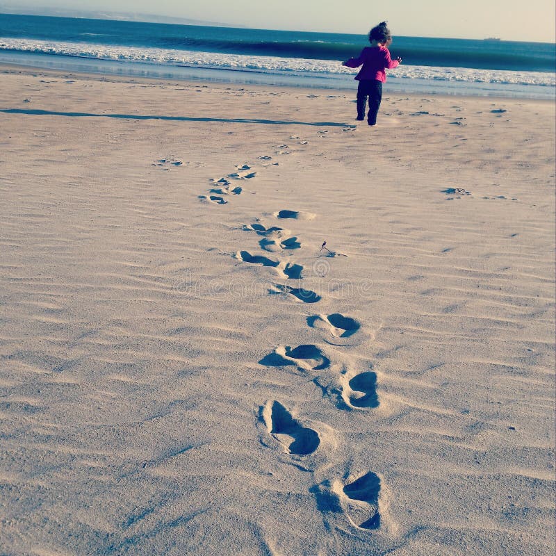 Child footsteps in sand stock image. Image of rocks, running - 2393363