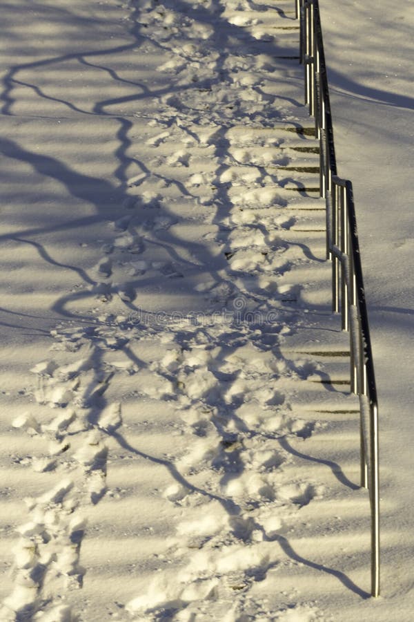 Footsteps in Snow Up Stairs Stock Image - Image of footprint, metal ...