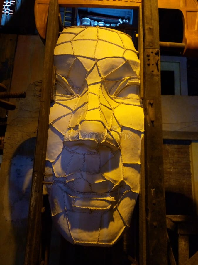 This is a Forced Man`s Face Sculpture.Which is Surrounded by Troubles ...