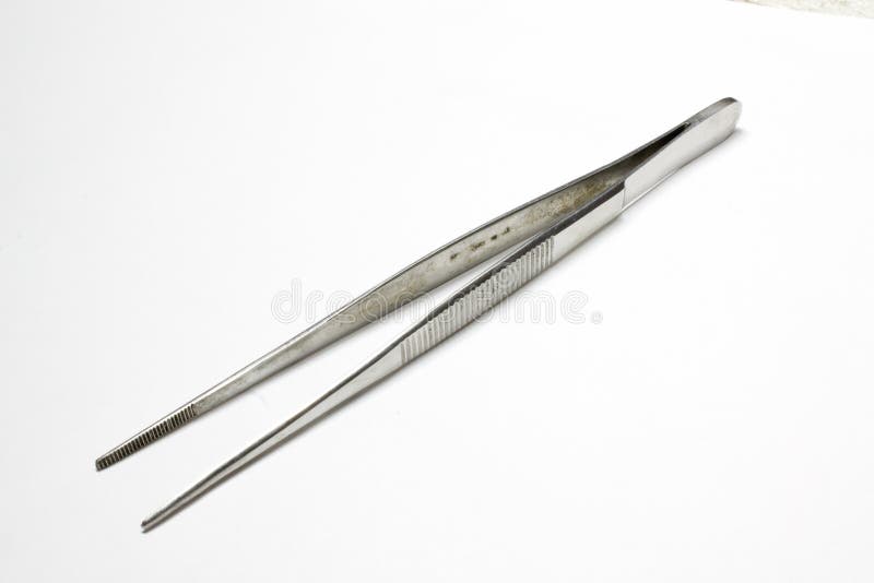 Old forceps close isolated stock photo. Image of handle - 81713388