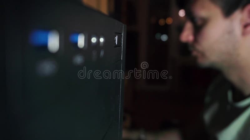 In the Foreground, a Computer, in the Background a Blurred Guy Stock ...