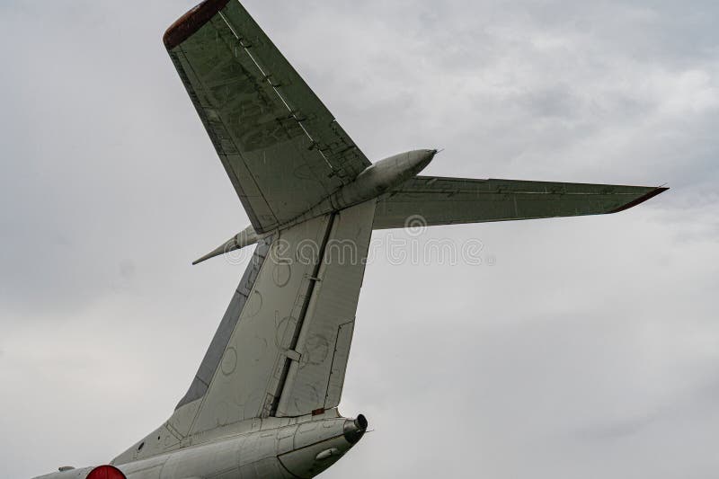 Foreground View of a Grey or Light Blue Propeller Aircraft, Tail ...