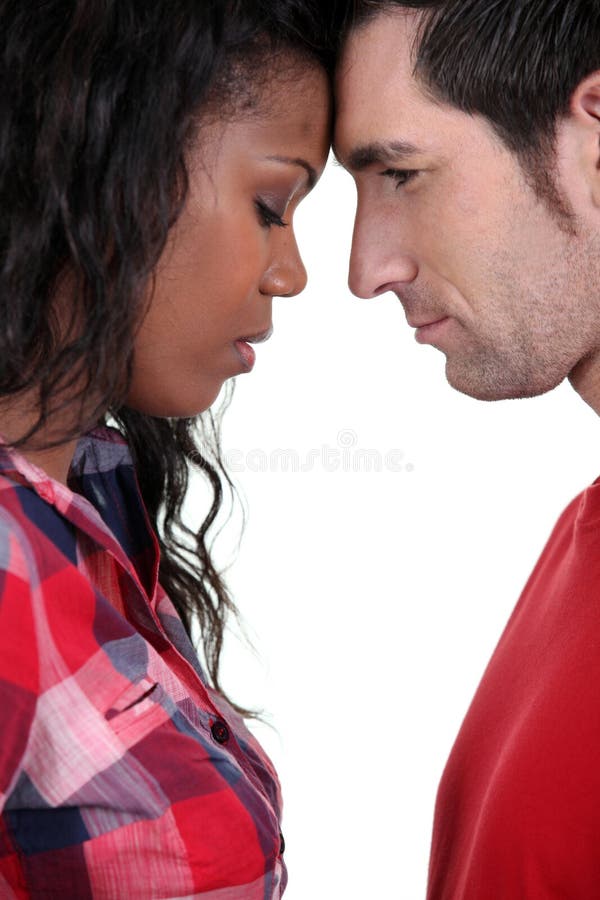 Forehead against forehead stock photo. Image of handsome - 26937906