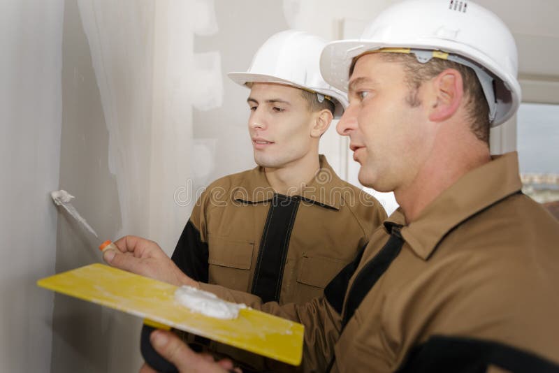Foreman Builder and Construction Worker Working Indoor Stock Photo ...
