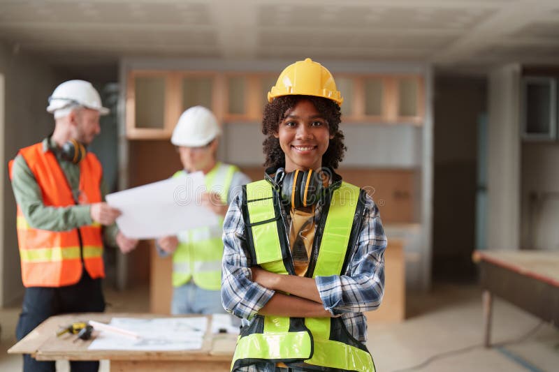 Foreman Builder Woman at Construction Site. American African Foreman ...