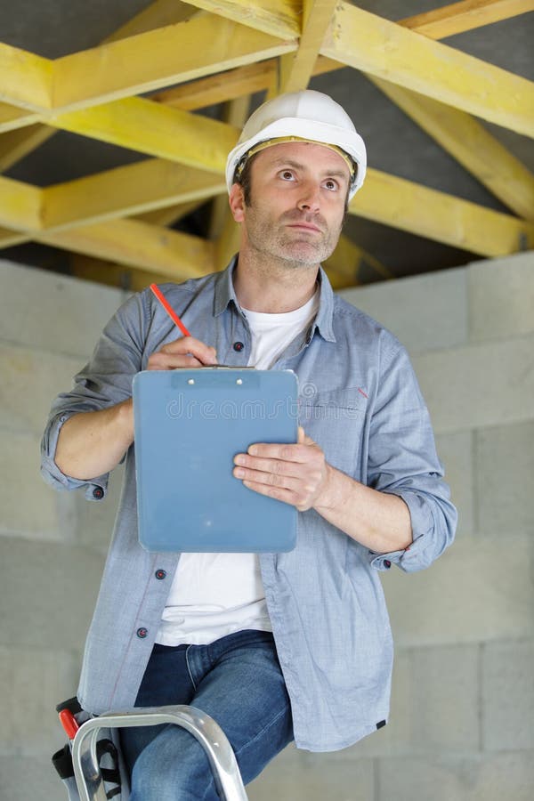 Foreman Checking Something with Clipboard Stock Image - Image of ...