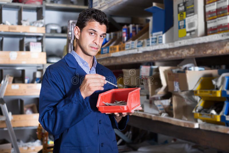 Foreman is Choosing Small Details Which is in Boxes Stock Photo - Image ...