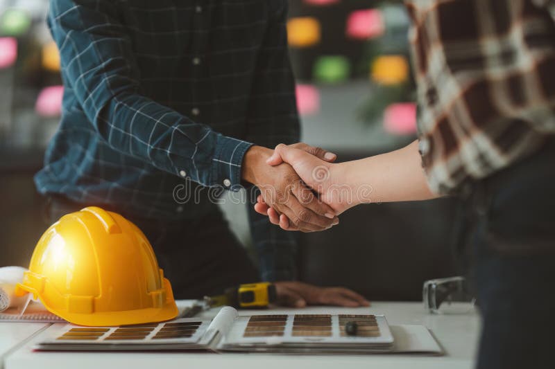 Foreman or Civil Engineer Handshake Making Modern Construction ...