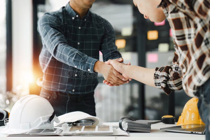 Foreman or Civil Engineer Handshake Making Modern Construction ...