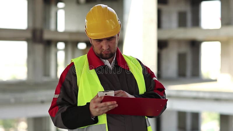 Foreman at Construction Site Makes Notes Stock Video - Video of person ...