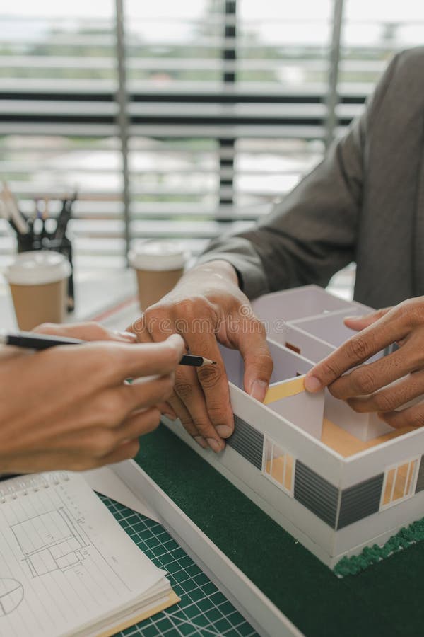 A Foreman is Consulting with an Engineer about House Structure, N ...