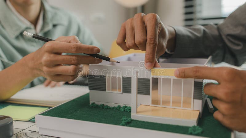 A Foreman is Consulting with an Engineer about House Structure, N ...