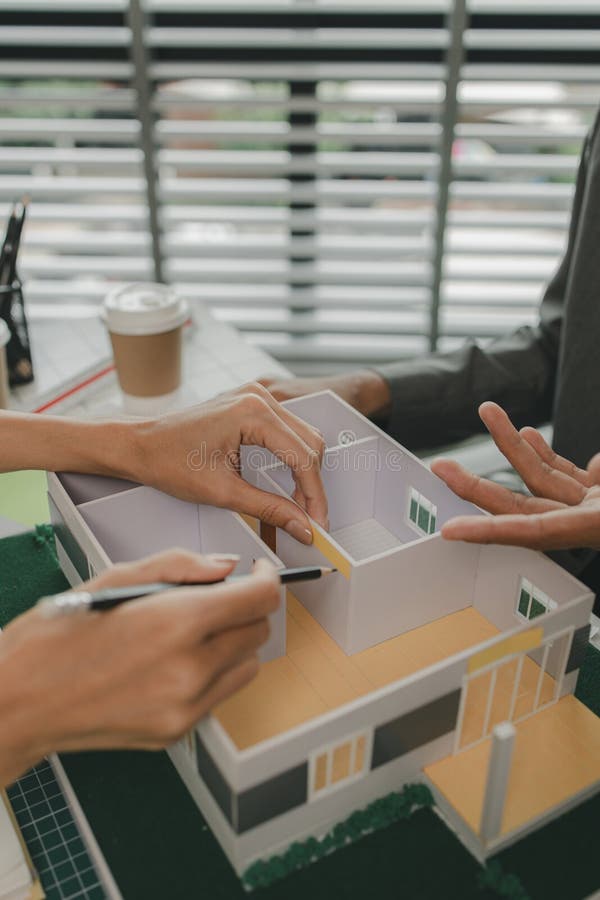 A Foreman is Consulting with an Engineer about House Structure, N ...