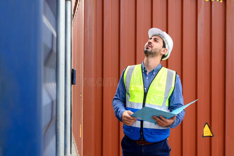 Foreman or Engineer Wears White Helmet and Reflection Shirt To Control ...