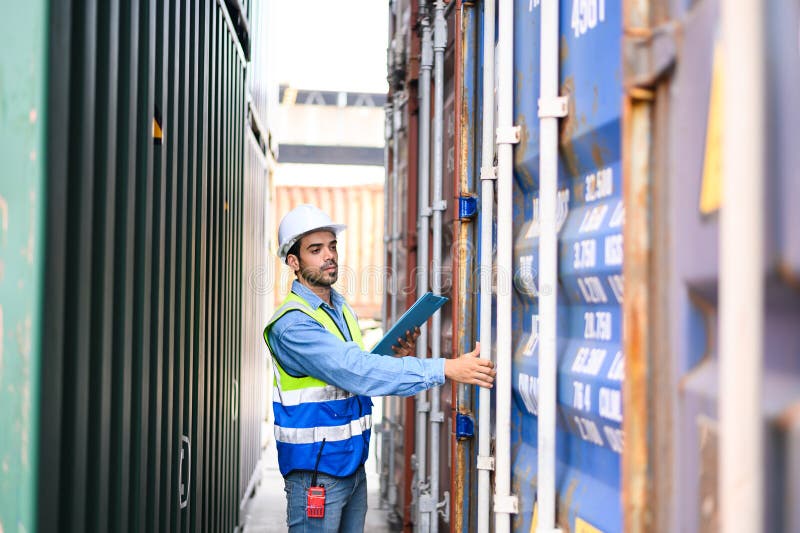 Foreman or Engineer Wears White Helmet and Reflection Shirt To Control ...