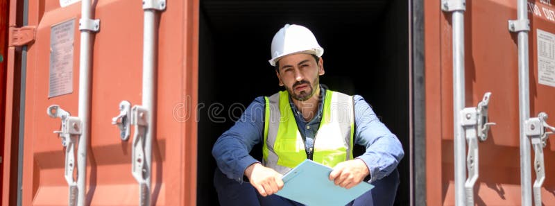 Foreman or Engineer Wears White Helmet and Reflection Shirt To Control ...