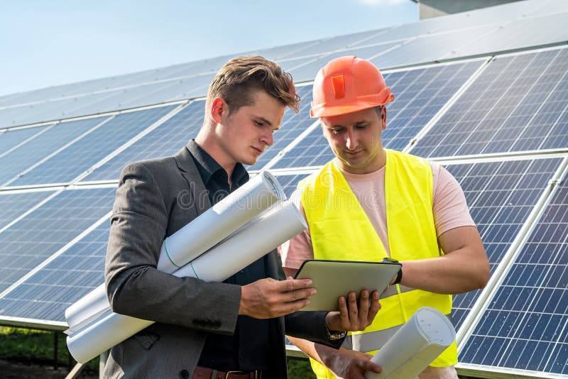 Foreman and Engineer Work during Checking and Repairing Solar ...