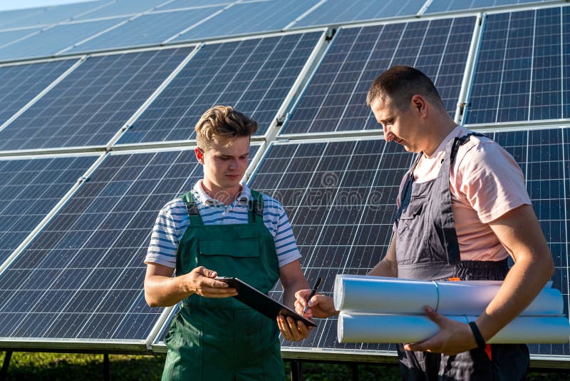 Foreman and Engineer Work on the Restoration and Inspection of Solar ...