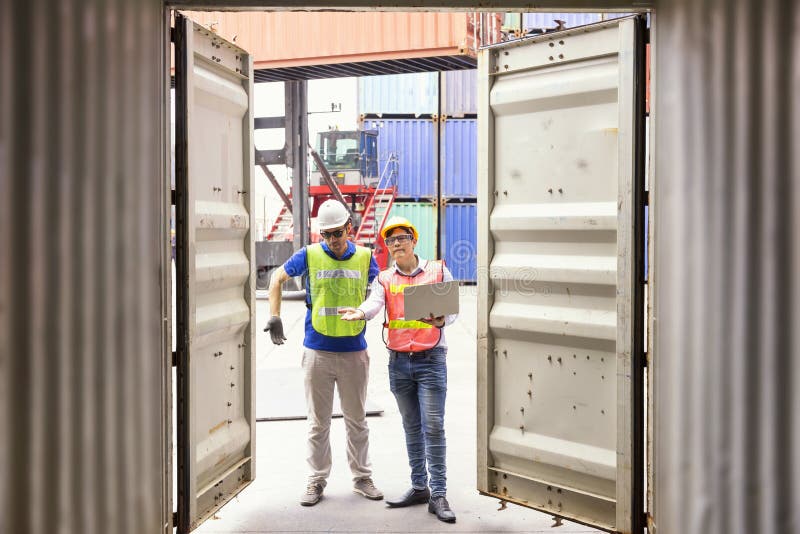 Foreman Inspecting the Cargo Container. Foreman and Staff are Opening ...