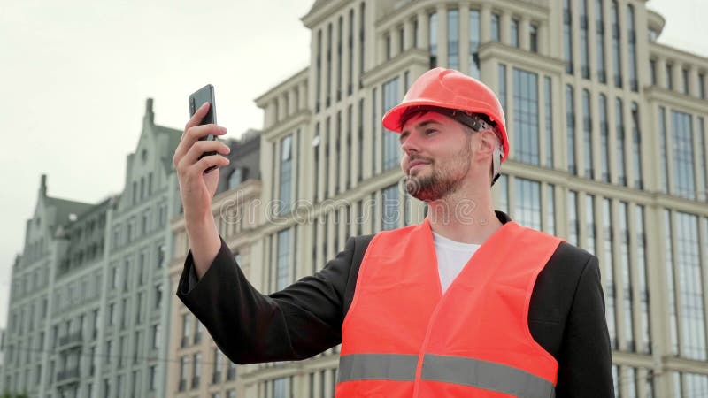 Foreman with Modern Gadget Working at Construction Site Stock Image ...