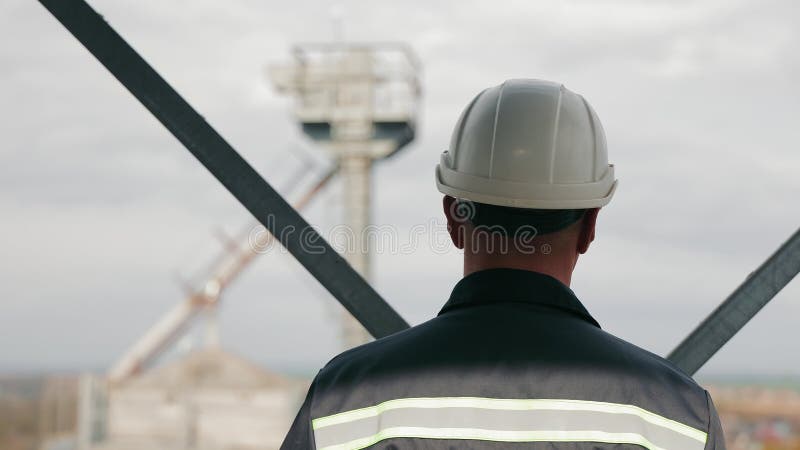 Foreman Overlooking Construction Site, Construction Site Foreman in ...
