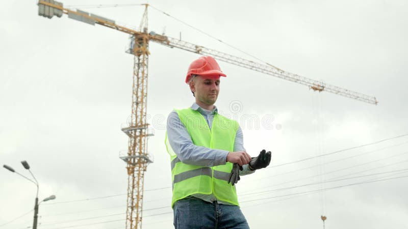 Foreman in Protective Helmet Preparing for Inspection of Building Site ...