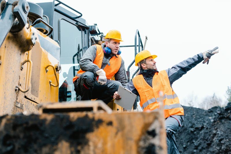 Foreman Showing Worker in Open-cast Mining Pit Direction Stock Image ...