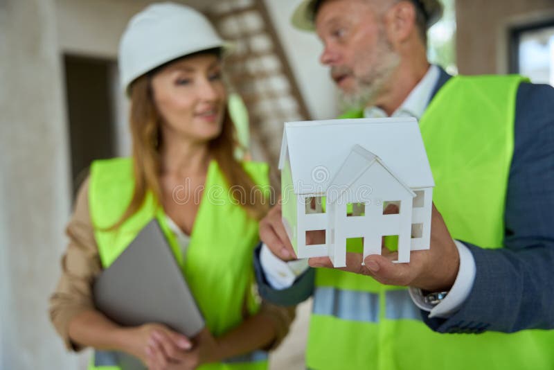 Foreman Shows Real Estate Agent a Small Model of House Stock Image ...