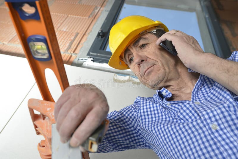 Foreman Speaking on Telephone Stock Image - Image of call, person: 73347685