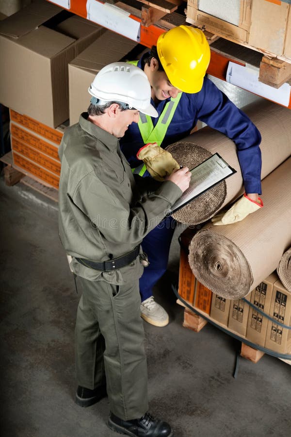 Supervisor Writing Notes at Warehouse Stock Photo - Image of order ...