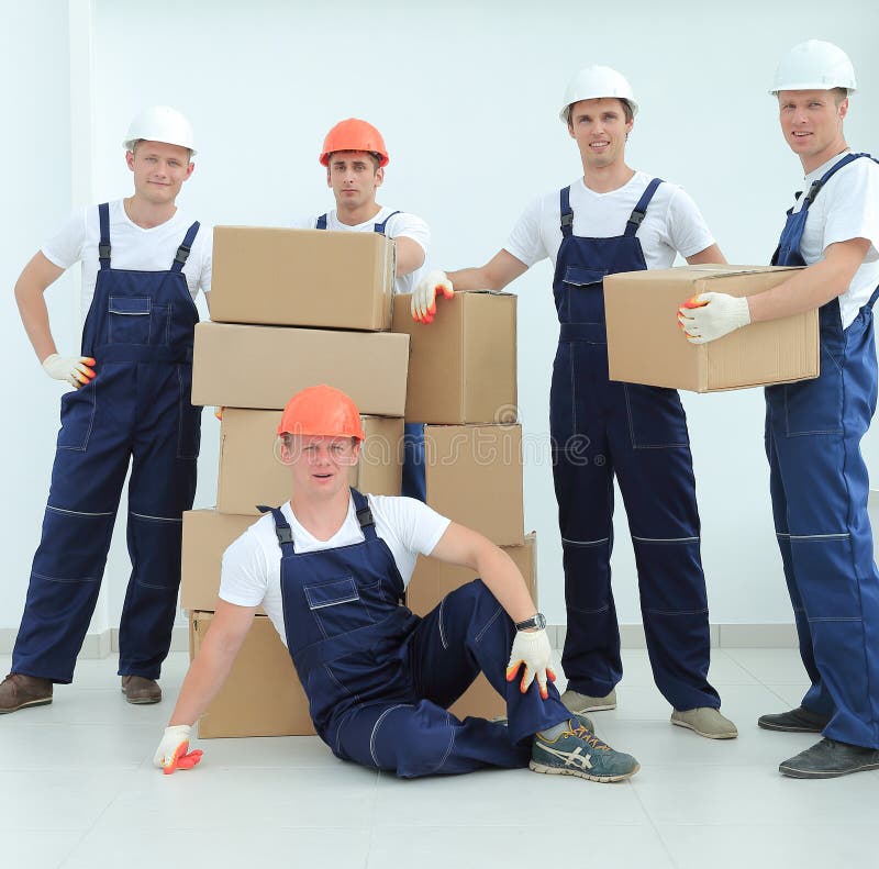 Foreman and Team Builders with Boxes Stock Photo - Image of business ...